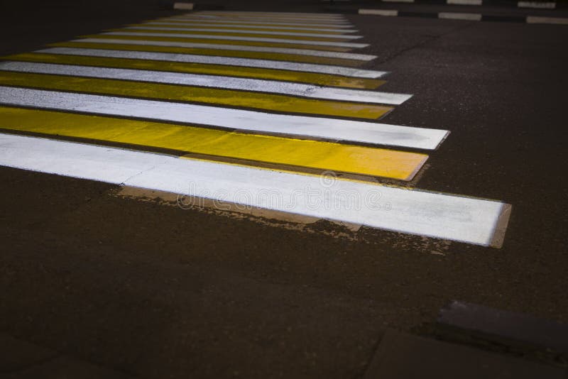 Night Shot of Zebra Traffic Walk Way Covered with Fluorescent Paint ...