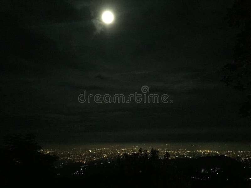 Night sky and city lights stock photo. Image of view - 96566572