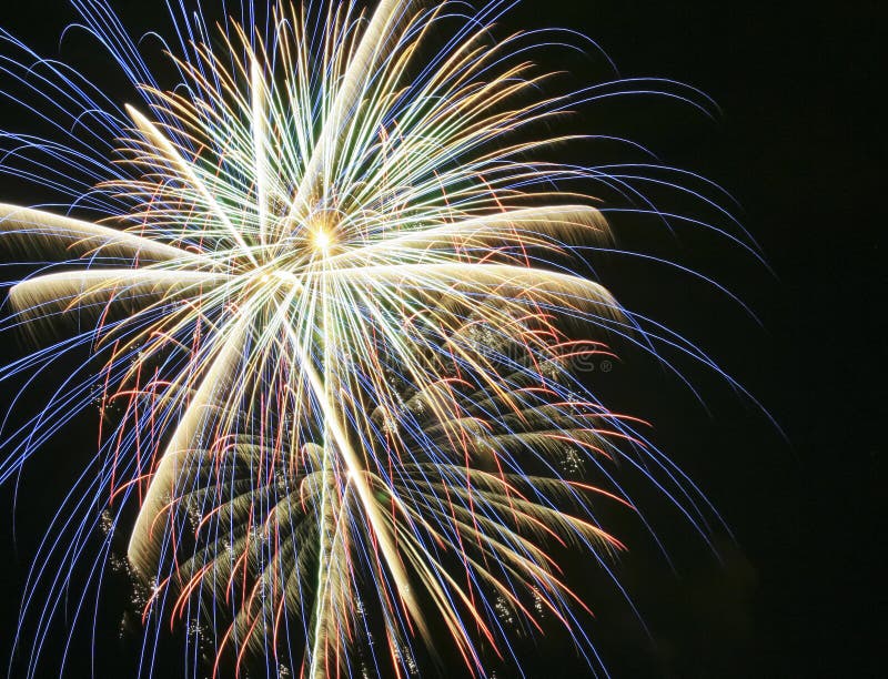 Exploding Fireworks stock photo. Image of glittering, brilliant - 1595522