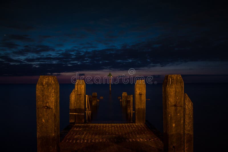 Night sky over pier stock photo. Image of night, clouds - 24689820