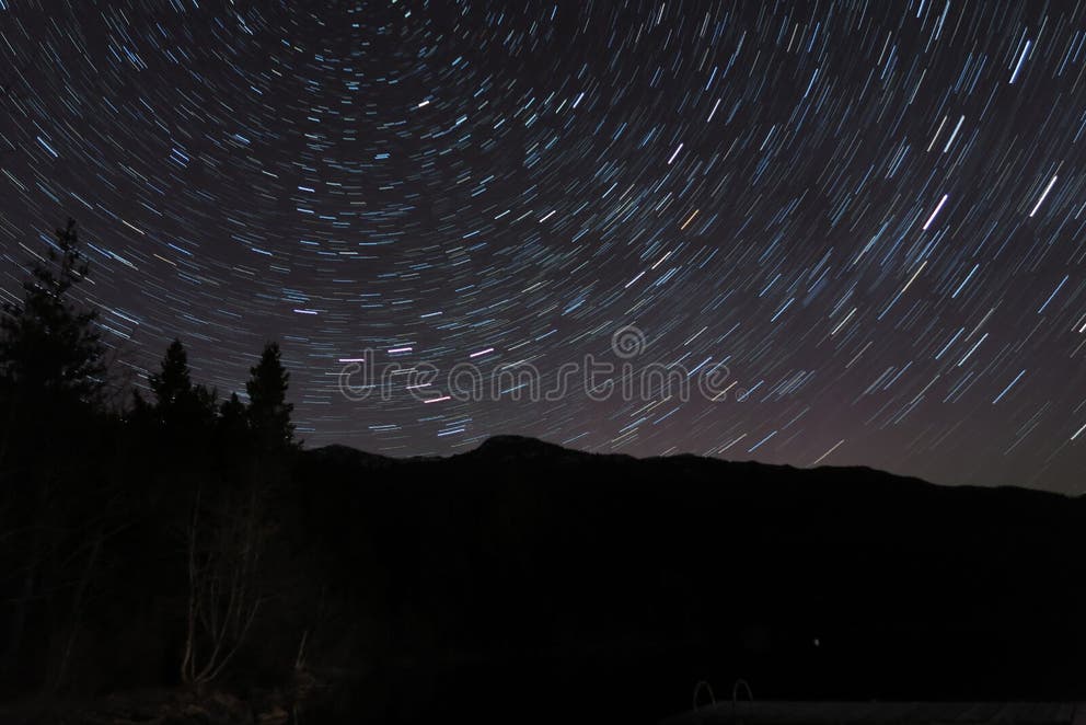 Night sky in a rotation stock photo. Image of space - 254387418