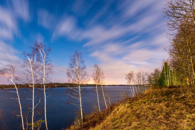 Night Sky with Stars and Clouds in Long Exposure Shot Stock Photo ...