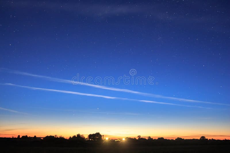 Stripes of Silver Clouds in the Sunset Sky at Night Stock Image - Image ...