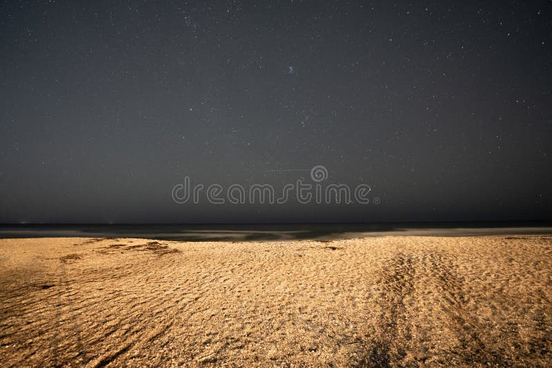 Night Stars Over the Beach Sand Stock Photo - Image of long, starry ...