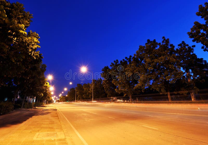 Night street view stock photo. Image of business, movement - 33029894