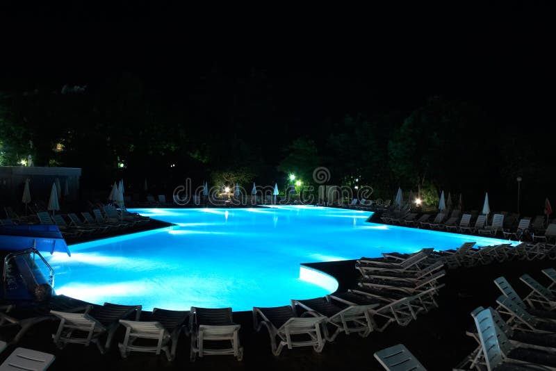 Night swimming pool stock image. Image of palm, hotel - 2666535