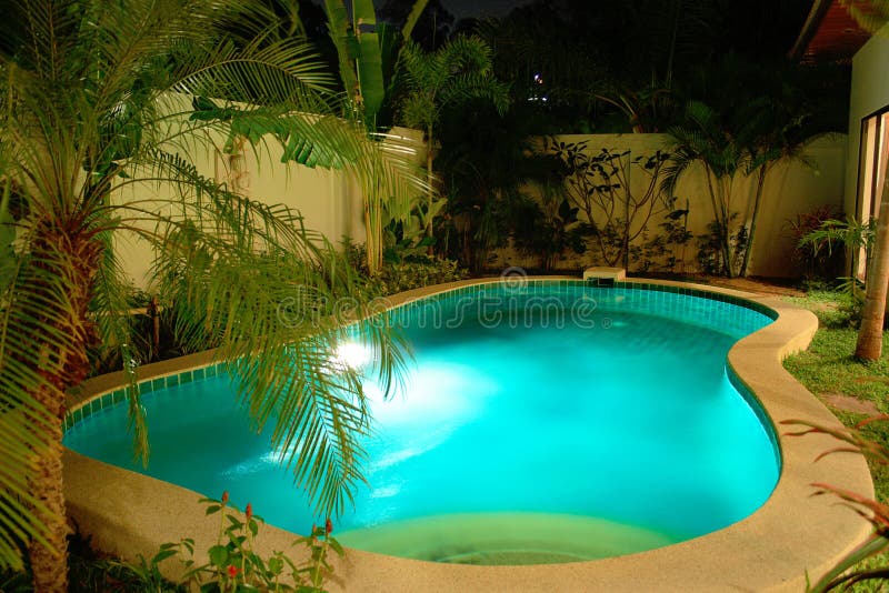 Night Swimming Pool In Tropical Garden Stock Photo - Image of leisure ...