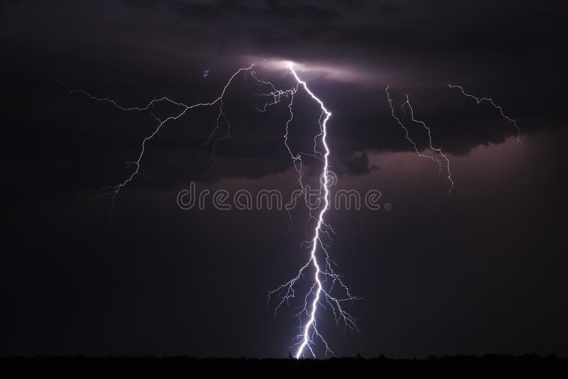 Lightning Strike Over a Field Stock Image - Image of lightning ...