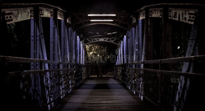 Night Time on a Bridge Full of Locks Stock Image - Image of locks ...