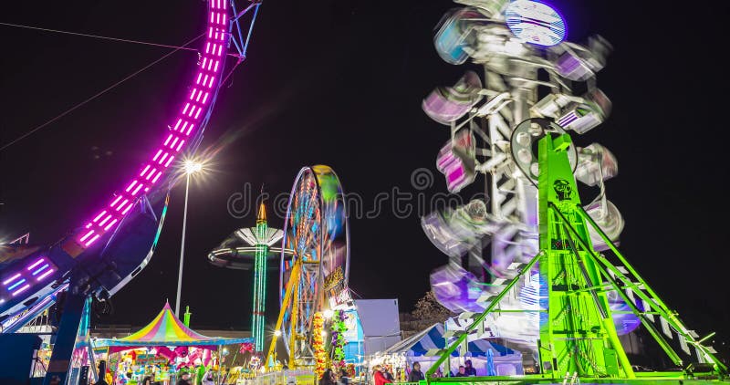 Day To Night Timelapse of Carnival Rides in Motion Stock Video - Video ...