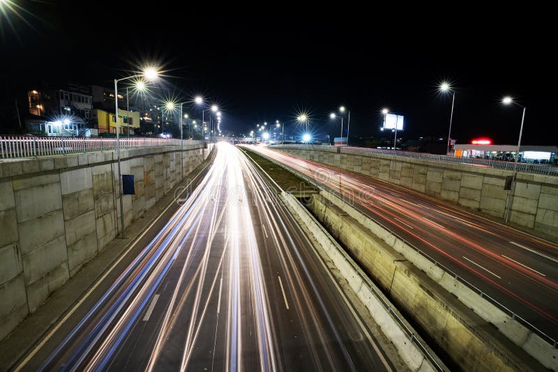 Night Traffic Junction Road with Lights of Vehicle Movement. Editorial ...