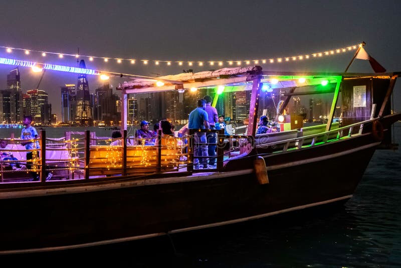 Night View of a Boat with Tourist at the Doha Corniche Editorial Stock ...
