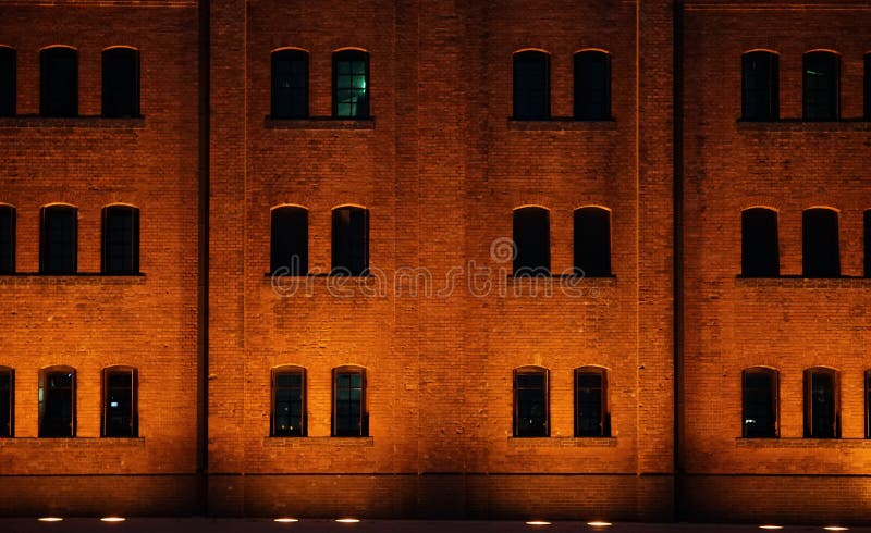 Night View of Brick Warehouse Stock Photo - Image of darkness, facade ...