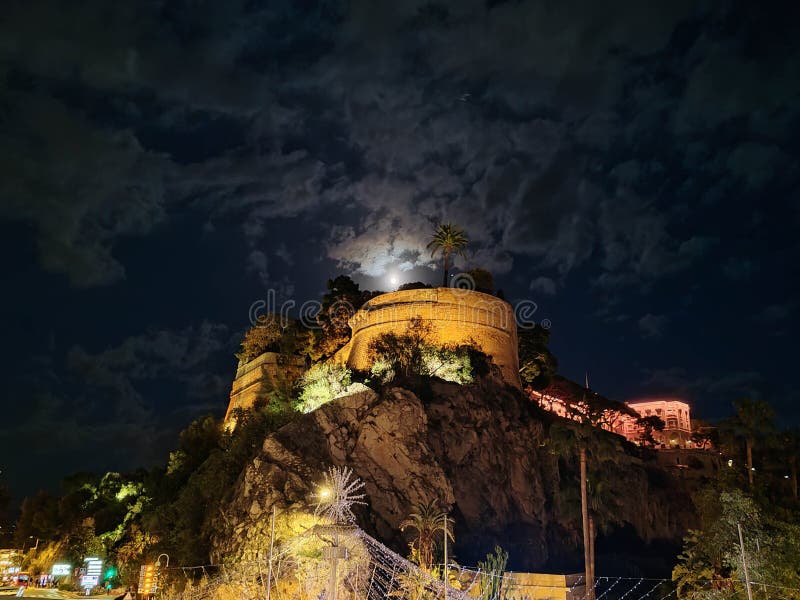 Night View of a Cliff in Monaco with a Castle on Top Stock Photo ...