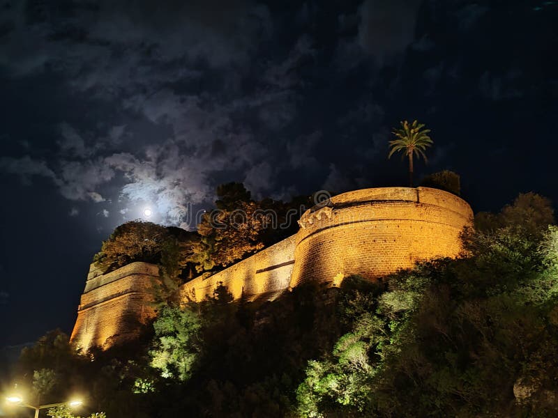 Night View of a Cliff in Monaco with a Castle on Top Stock Image ...