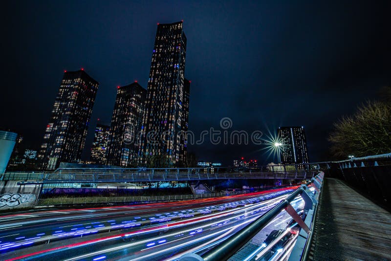 Night View of Deansgate Square with Its Four Towers, and Blurred Lights ...