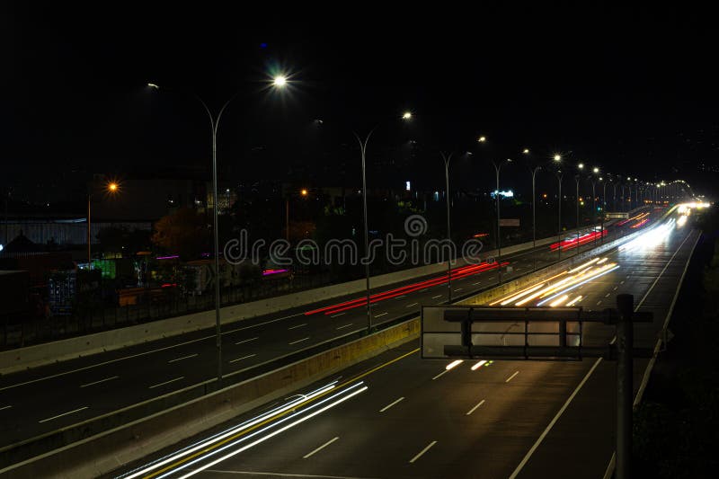 Night View of the Highway. Photo with Panning Technique Using Low ...
