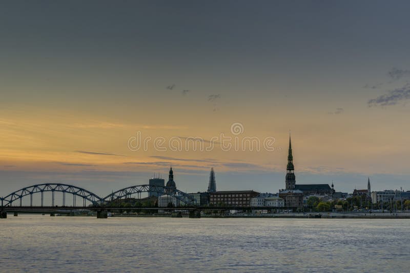 Night View on the Illuminated Riverside with Reflection on the River in ...