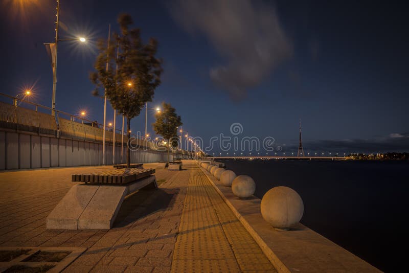 Night View on the Illuminated Riverside in Riga Stock Image - Image of ...