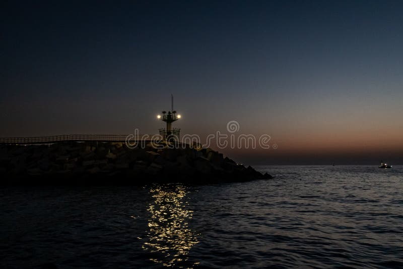 Night View of the Lighthouse Standing at the Exit from Haifa Bay in the ...