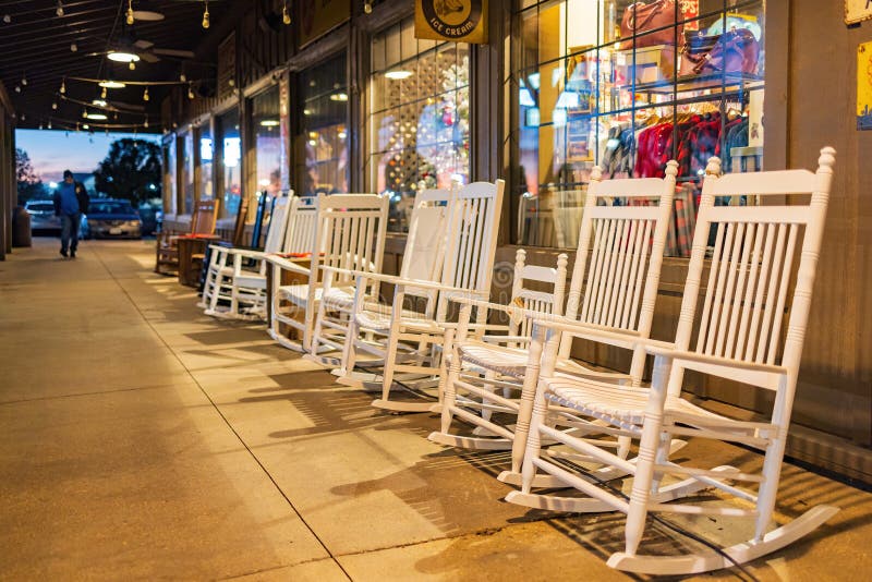 Night View of an Old Store with Many Wooden Chairs Stock Photo - Image ...