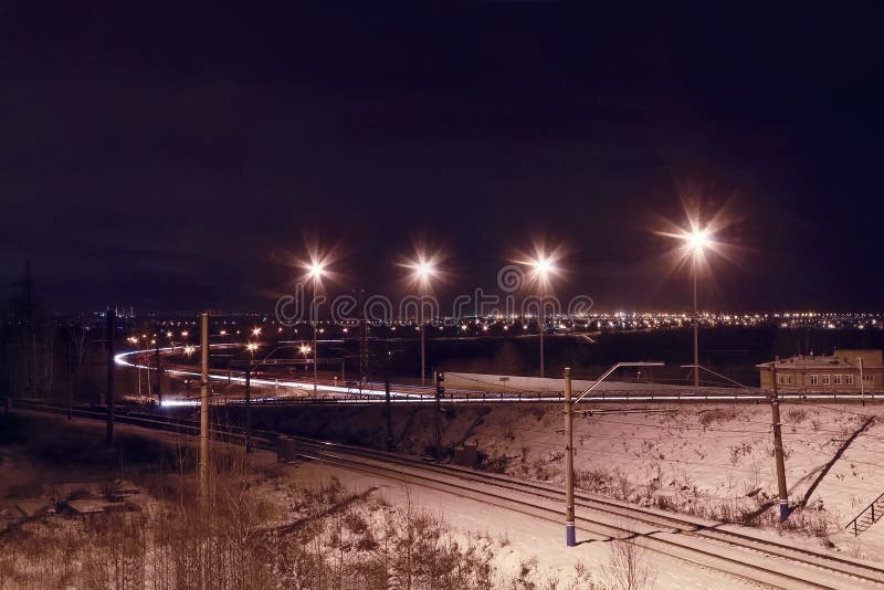 Night View of Railroad with Lanterns and Lights of City Stock Image ...