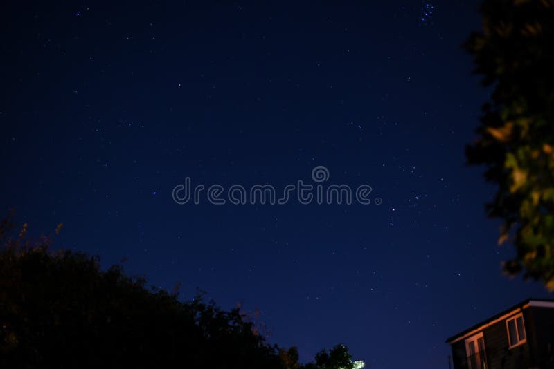 Night View of Stars on a Clear Night from Urban Area from Low Angle ...