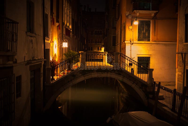 Night View of Venice with a Small Bridge in the Yellow Light of ...