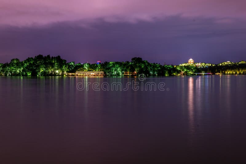 Night view of West Lake stock photo. Image of fish, landscape - 77532006