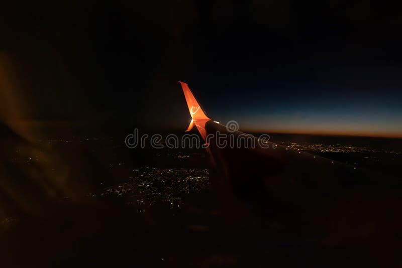 Night View of the Wing of the Plane through the Window. Flight and ...
