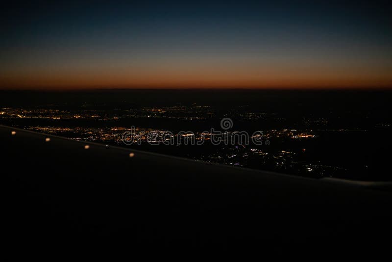 Night View of the Wing of the Plane through the Window. Flight and ...