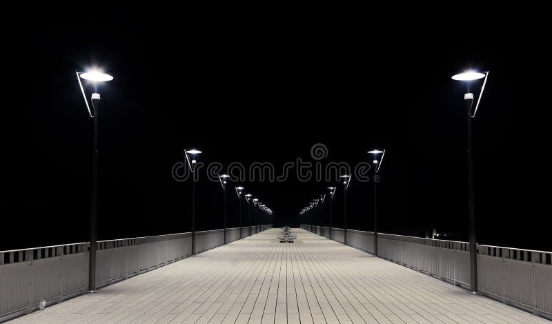 Night View of a Wooden Pier and Lamp Posts Stock Image - Image of beach ...