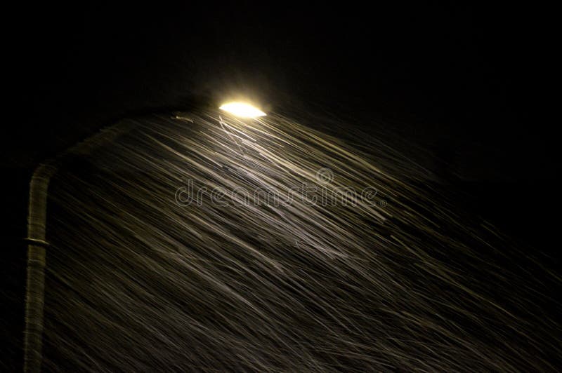 At Night, the Wind Blows and Snow Falls Stock Photo - Image of light ...