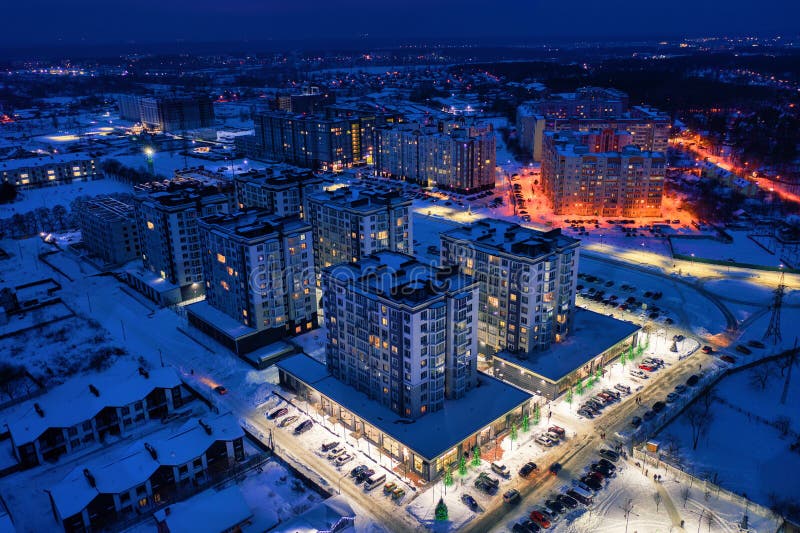 Night Winter City with Illuminated Streets. Cityscape, Drone View Stock ... Night Winter City with Illuminated Streets. Cityscape, Drone View Stock ...