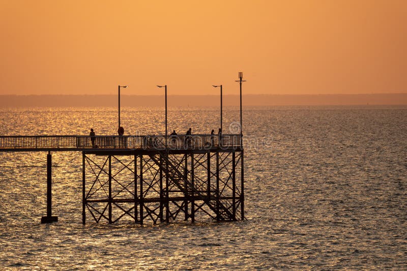 Nightcliff Jetty at sunset stock image. Image of outdoor - 294712507