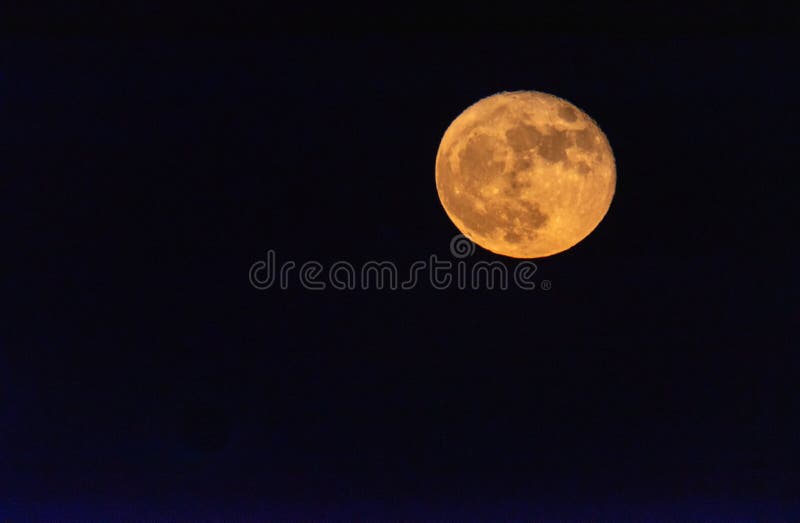 Nightfall with a full moon stock image. Image of sphere - 200143227