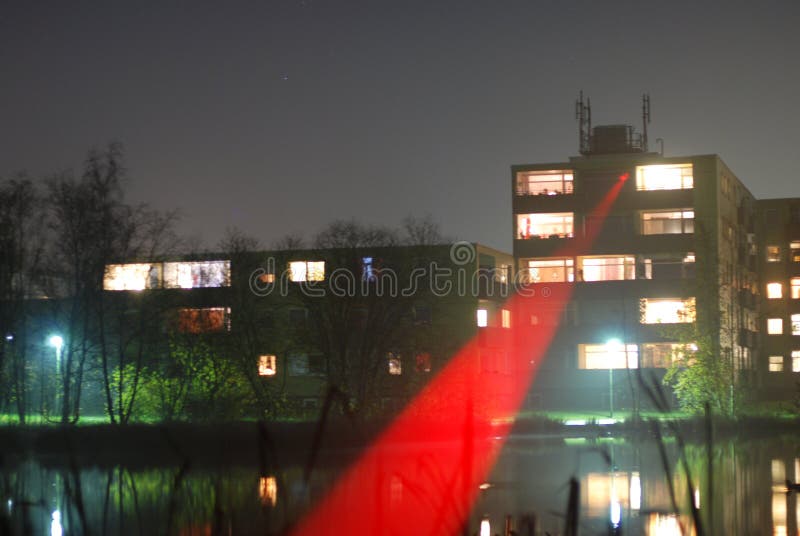 Nighttime Building with Red Light Reflection Stock Image - Image of ...