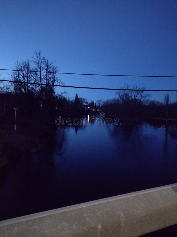 Nighttime at the Napanee River Stock Photo - Image of reflection, river ...