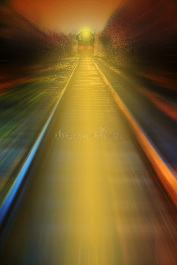 Nighttime Shot of an Electric Train with Light Crossing Stock Photo ...