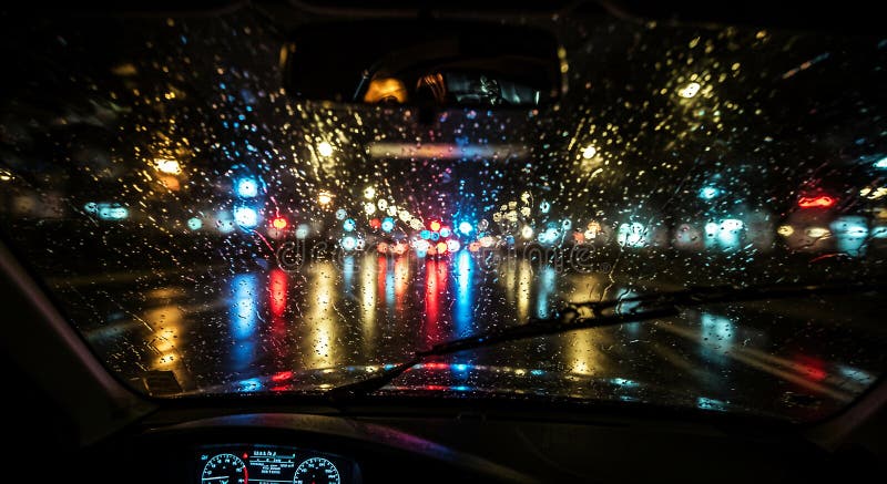 Nighttime View of Modern High-rise with Lighting and Reflections on the ...