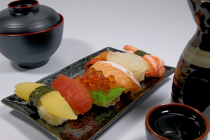 Nigiri Sushi and sake stock image. Image of sake, asia - 75419811