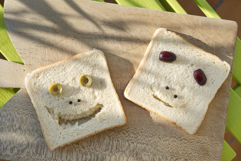 Two Bread Slices with Smiling Faces Grazing Light Stock Image - Image ...