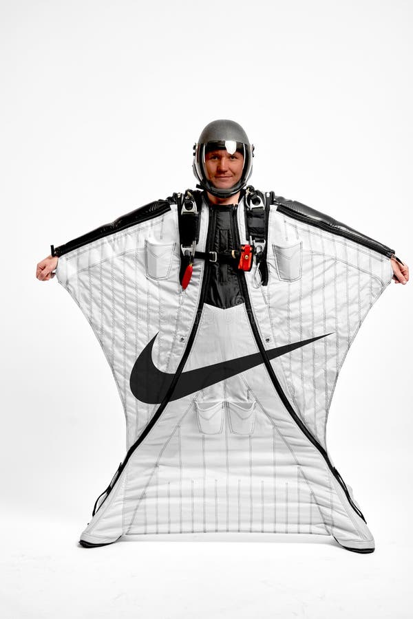 Nike. Men in Wing Suit Equipment.Demonstration of Popular Brands ...