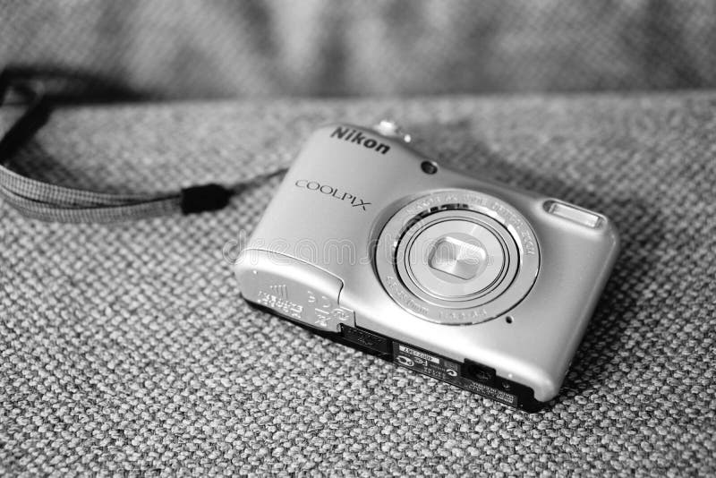 Nikon Coolpix Brand Digital Compact Camera on a Sofa Editorial Image ...