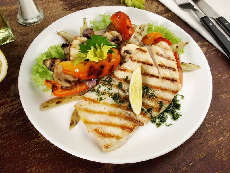 Nile Perch from Lake Victoria with Grilled Vegetables Stock Photo ...