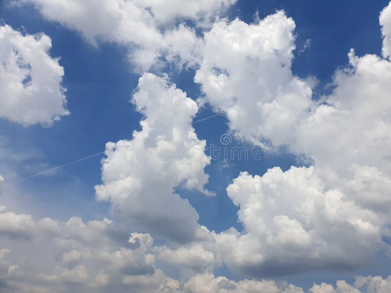 Nimbus Clouds in the Blue Sky Stock Photo - Image of beautiful, motion ...