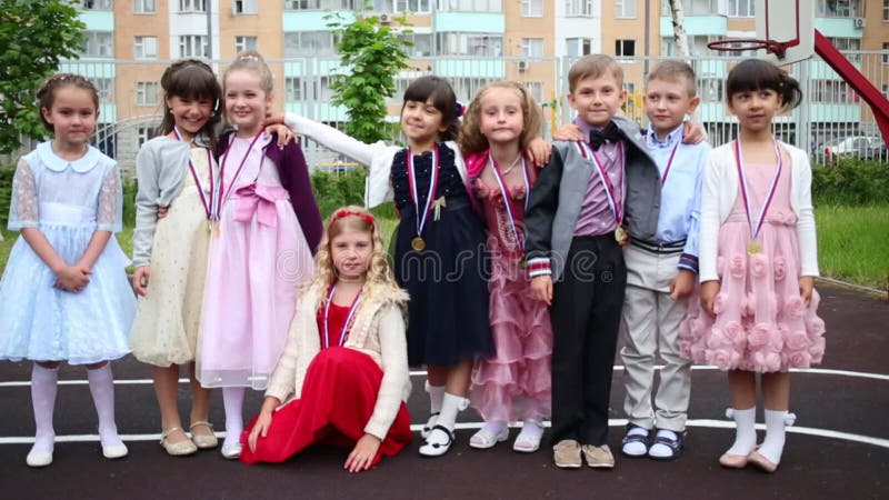 Nine Beautiful Children Pose on Playground Stock Video - Video of dress ...