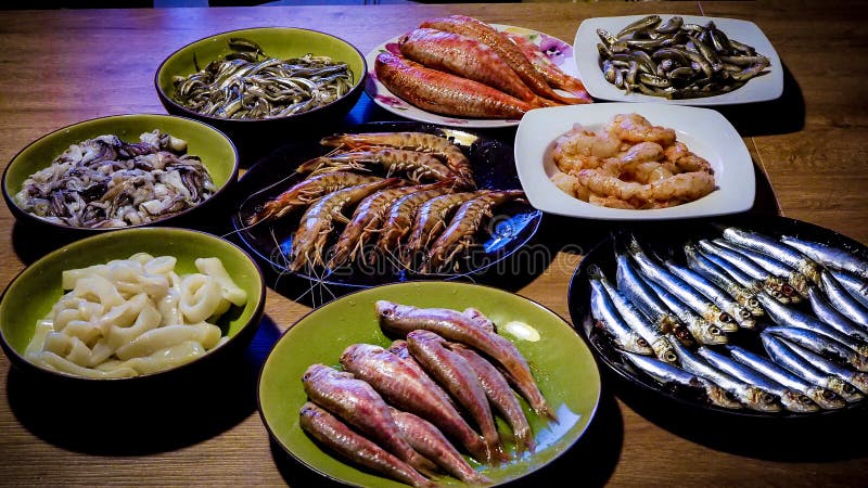 Fish dishes on the table stock image. Image of fish - 108568297