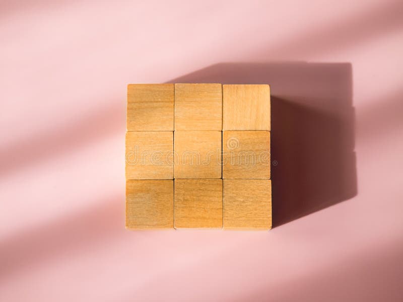 Nine Wooden Blocks in the Form of the Square on the Pink with the ...