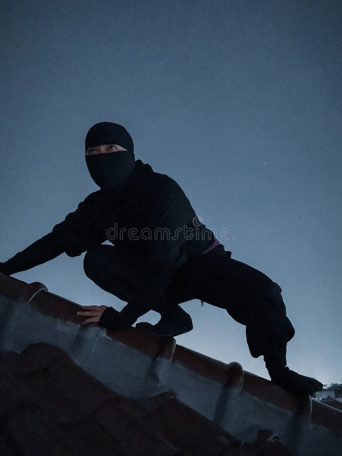 Ninja Sneaking in the Rooftop Looking for Prey Stock Image - Image of ...